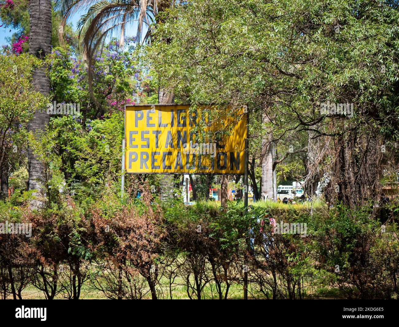 Yellow Sign that Says "Danger Pond Caution", but There is No Water in ...