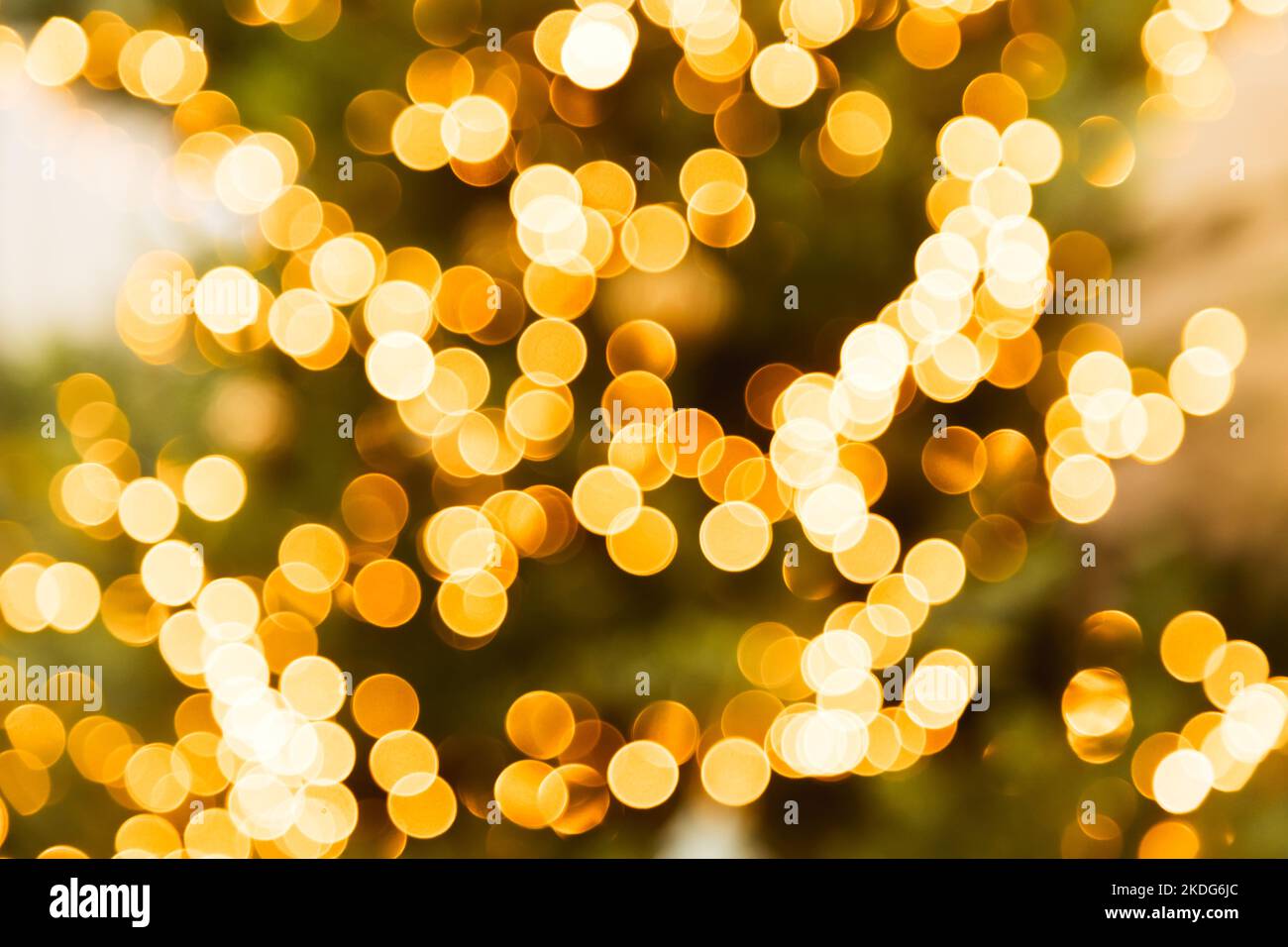 blurred, unfocused lights on christmas tree. Holiday winter holidays ...