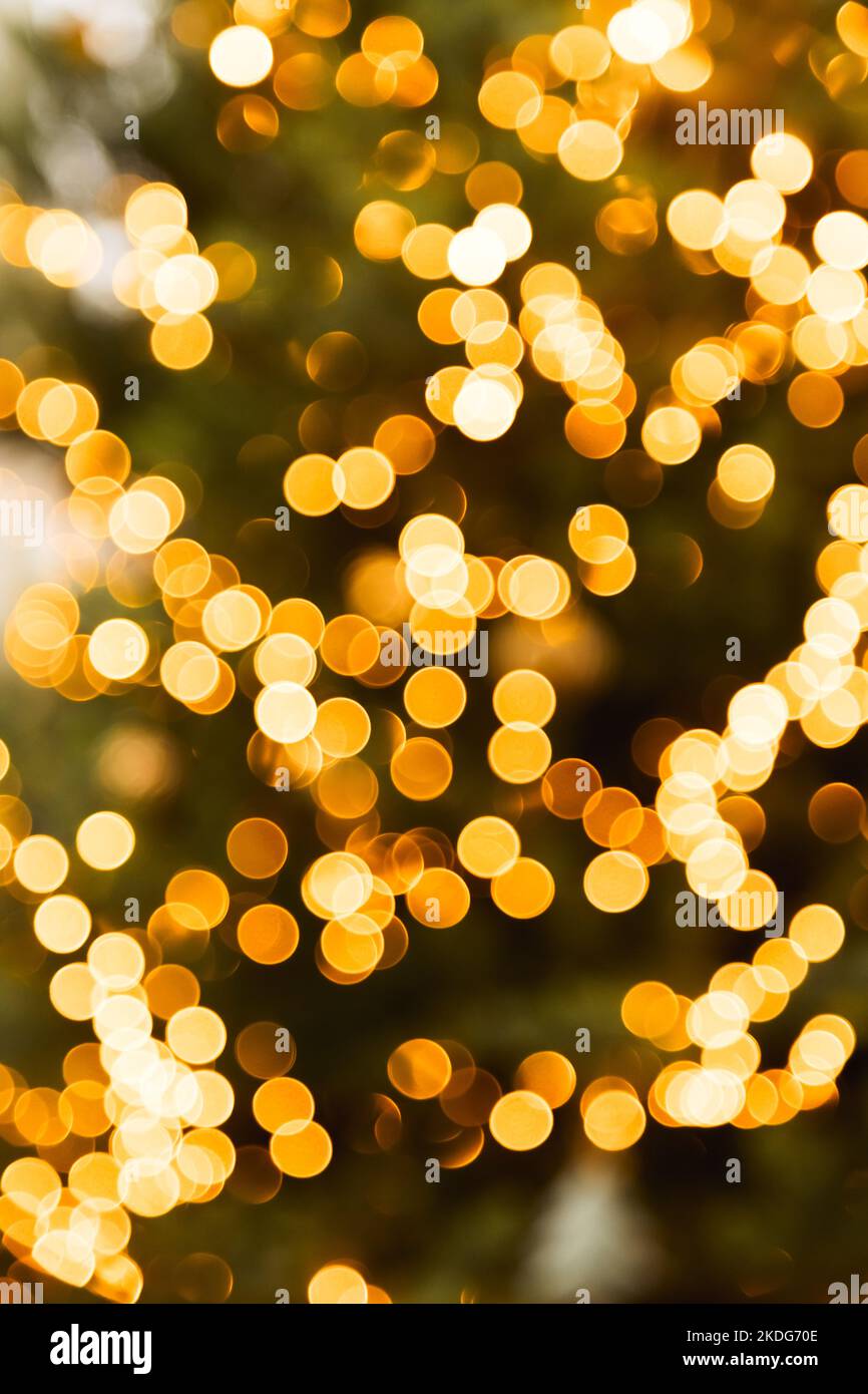 blurred, unfocused lights on christmas tree. Holiday winter holidays ...