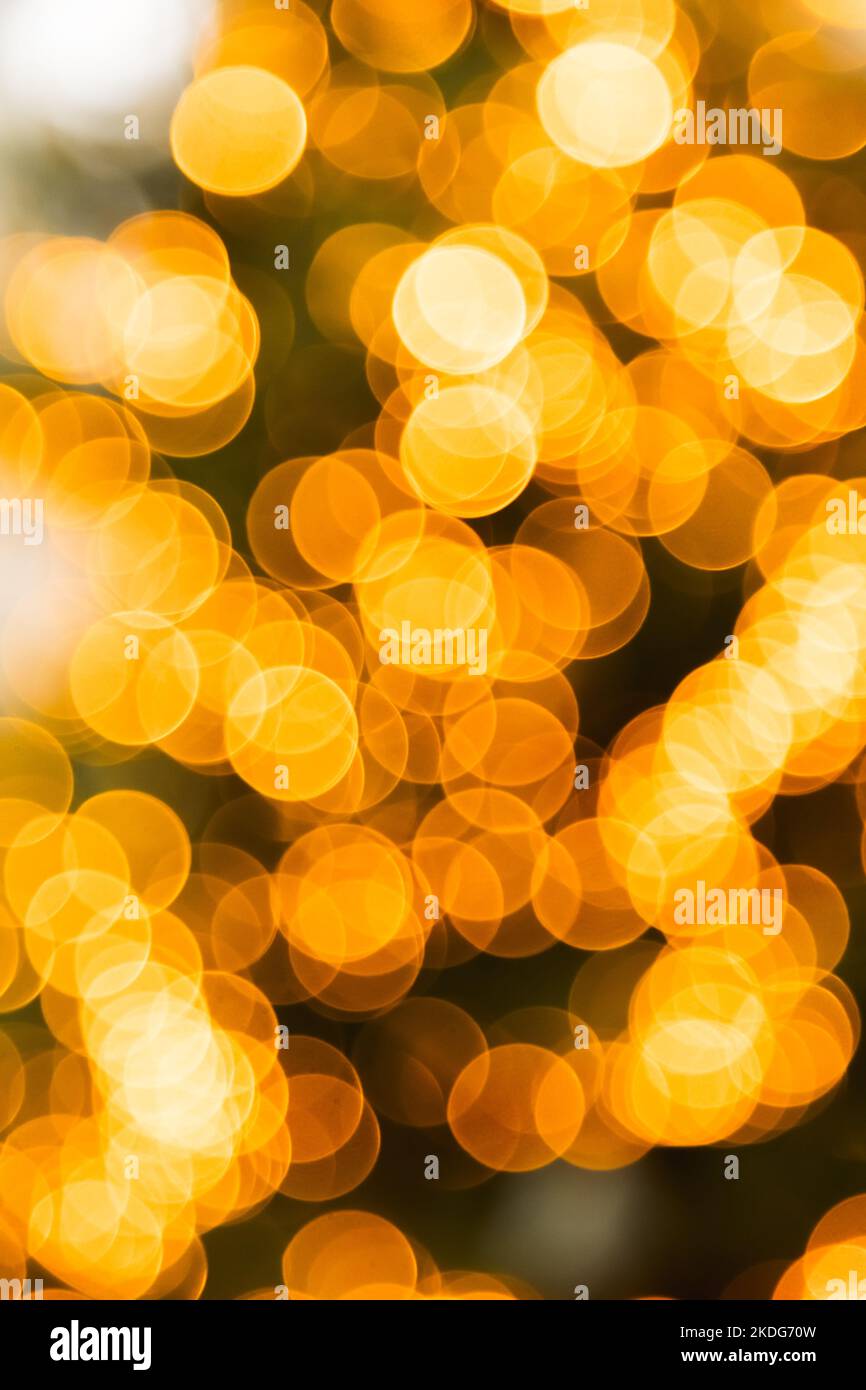 blurred, unfocused lights on christmas tree. Holiday winter holidays ...