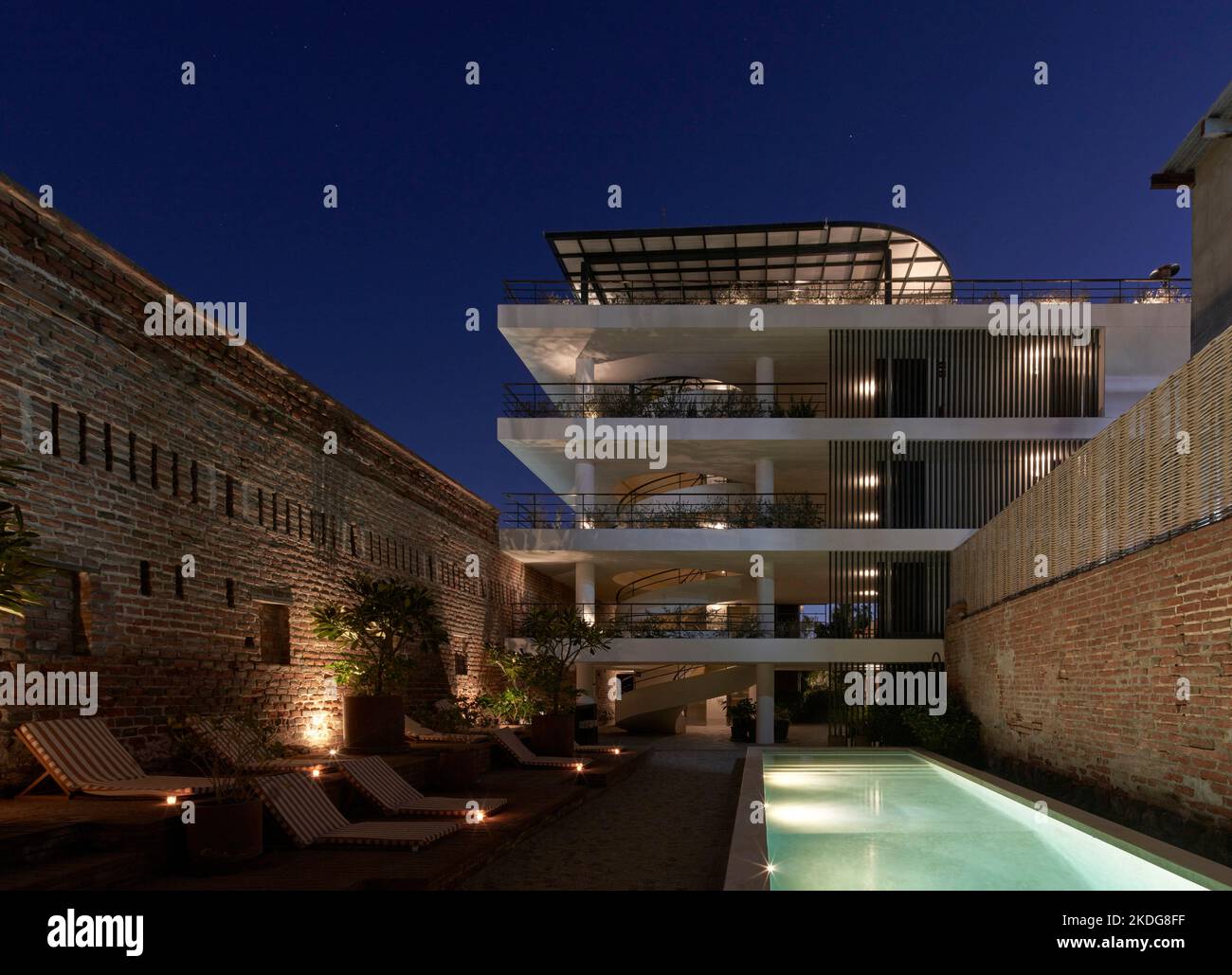 Pool at dusk. Hotel Baja Club, La Paz, Mexico. Architect: Max von Werz ...
