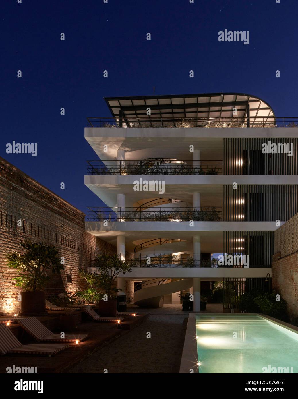 Pool at dusk. Hotel Baja Club, La Paz, Mexico. Architect: Max von Werz ...