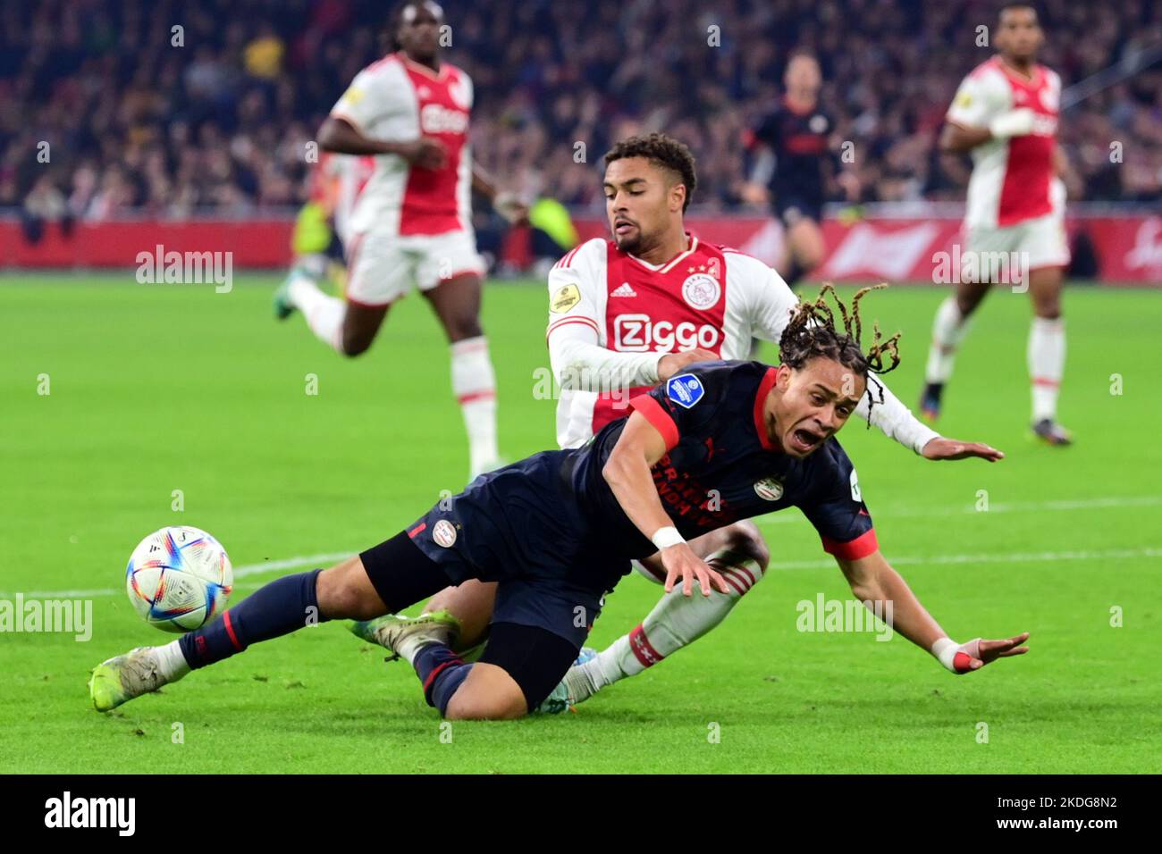 AMSTERDAM - (lr) Xavi Simons of PSV Eindhoven, Devyne Rensch of Ajax during the Dutch Eredivisie ...