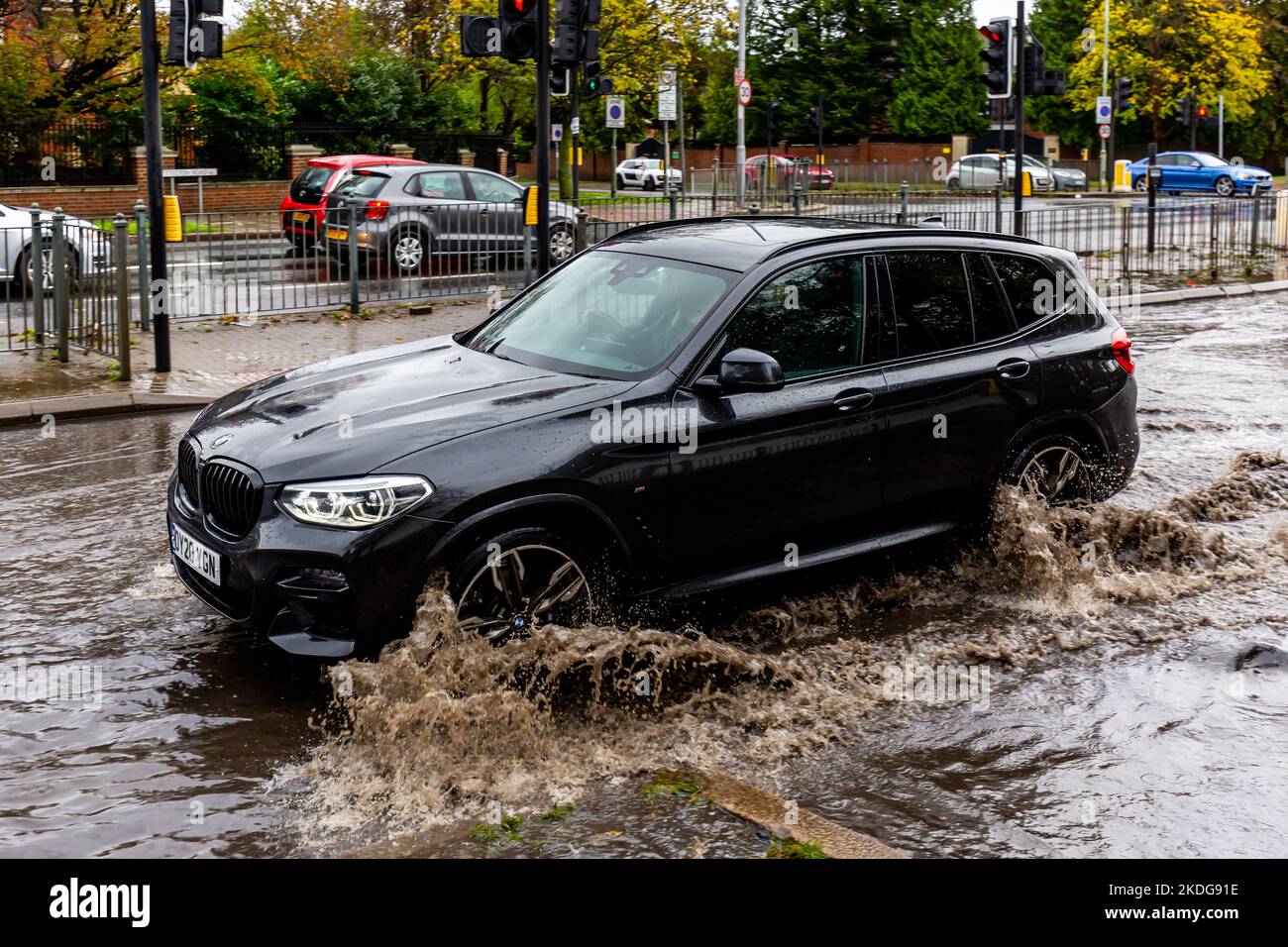 Massive downpour after overnight storm.Cars wade through at least a ...