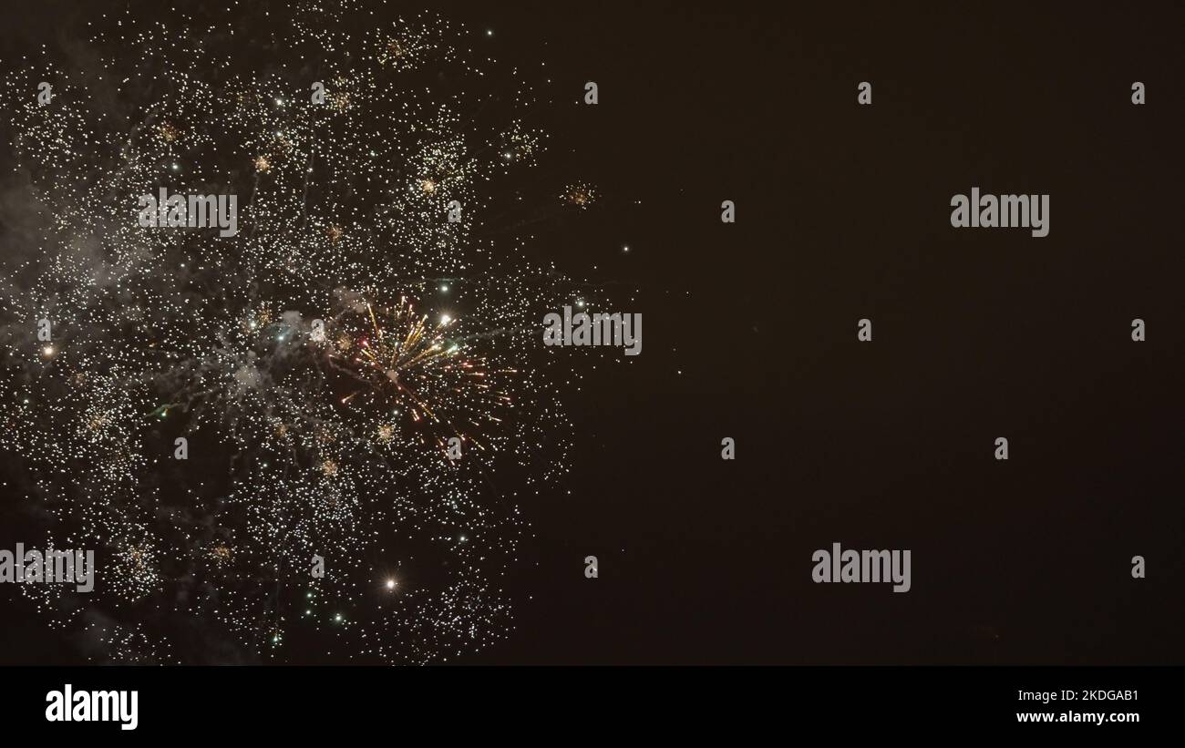 fireworks in dark sky, celebratation, wide photo Stock Photo - Alamy