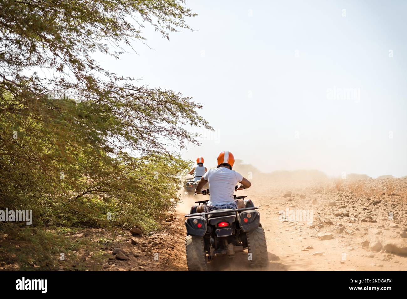 Quad Biking ATV adventure in desert terrain Stock Photo - Alamy