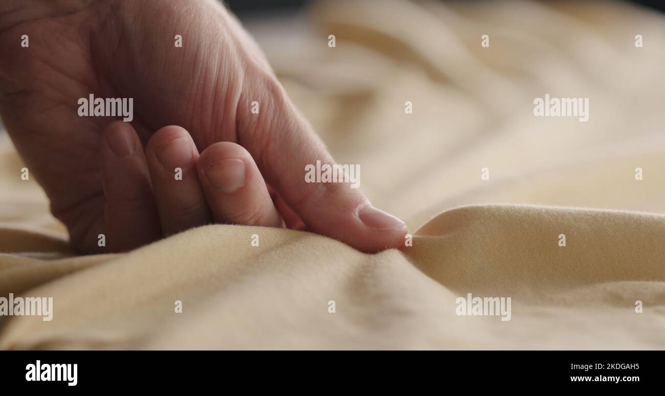 Finger touching cloth hi-res stock photography and images - Alamy