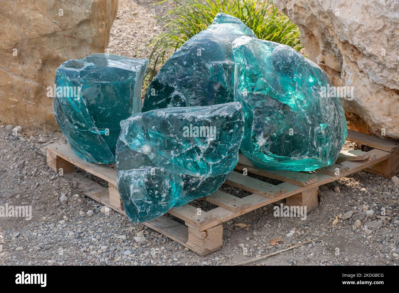 Heap of large Chunk of Aqua Glass Rock Slag on Wooden Industrial Pallet ...