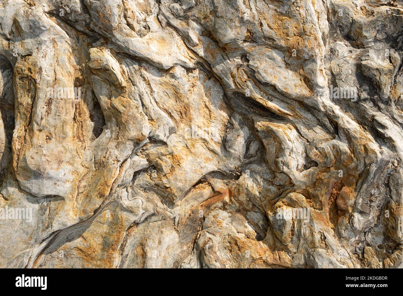 Rough embossed stone surface texture - background Stock Photo - Alamy
