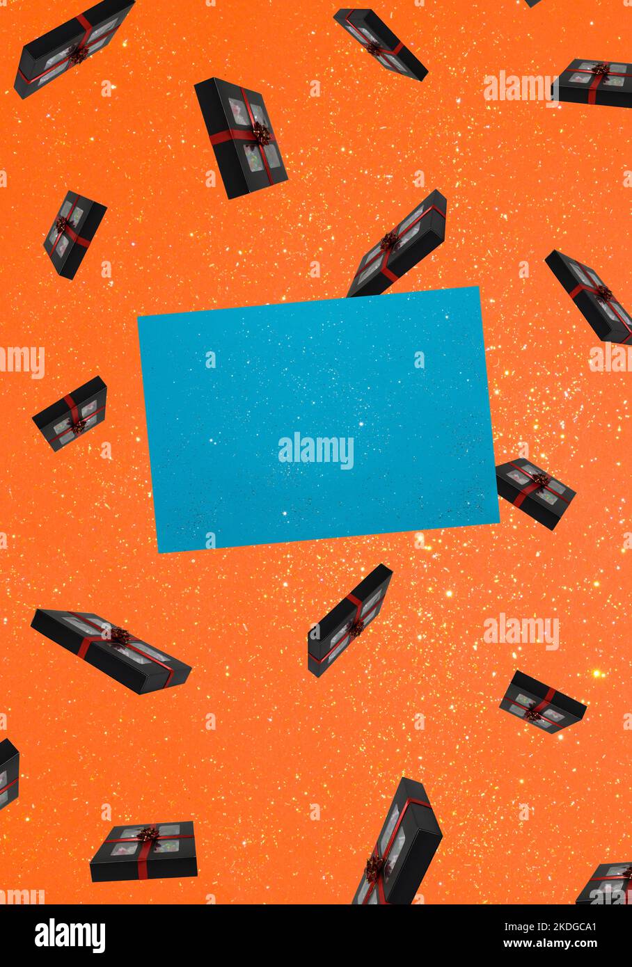 orange holiday background with blue card for copy space, black packets ...