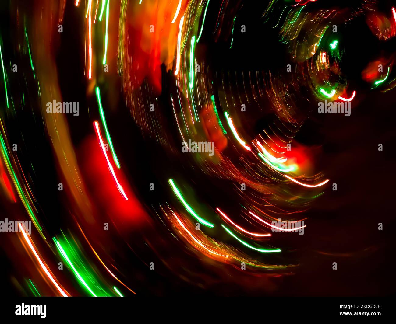 Light neon abstract lamps on black background blurry effect. Dark colorful bright neon light on ...