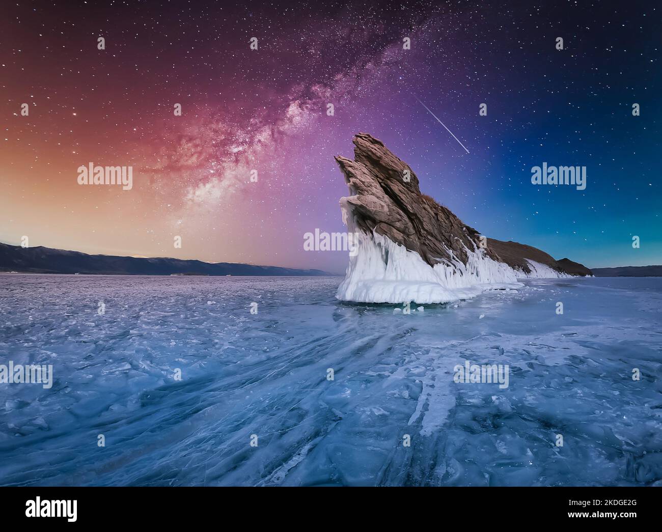 Landscape of Mountain with natural breaking ice and milky way in frozen ...