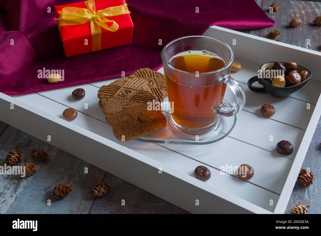 A cup of tea and spiced bisquit called speculaas on a tray to celebrate ...
