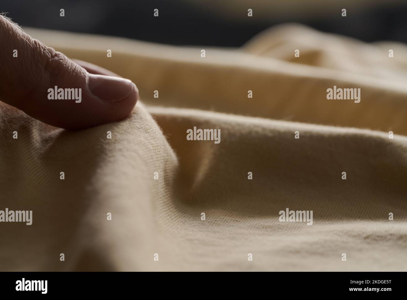 Man touching cotton hi-res stock photography and images - Alamy