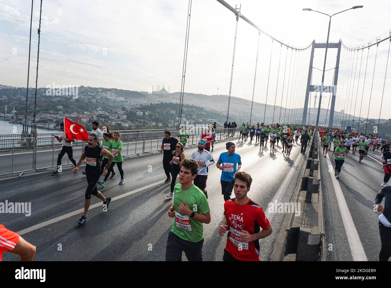 Athletes running on Bosphorus Bridge during the marathon. Istanbul ...