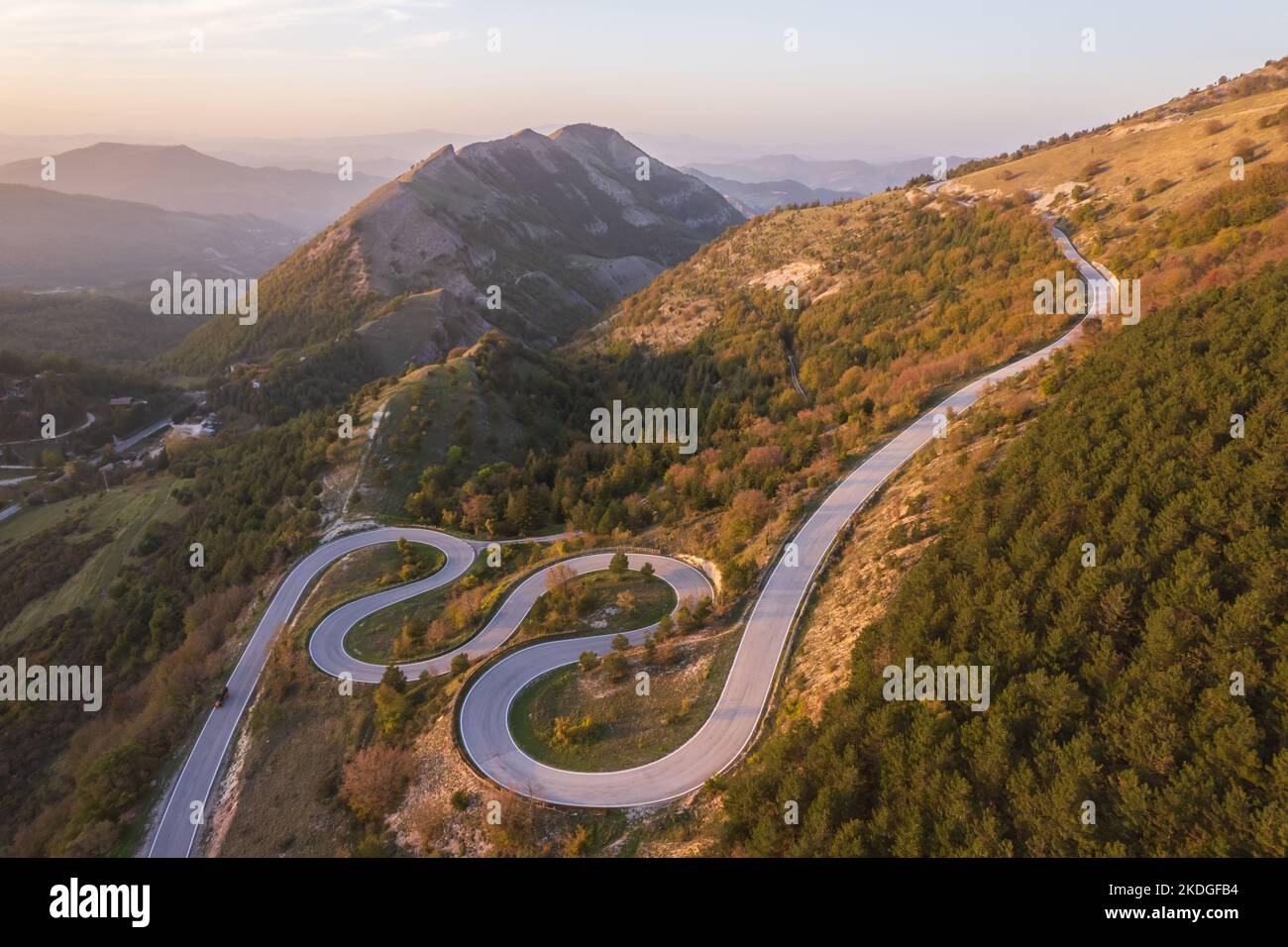 Aerial view of curvy road on monte Nerone slope in Marche region in ...
