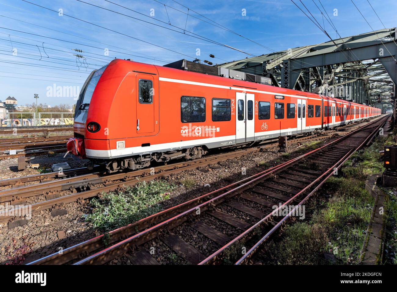 DB Regio train on the Hohenzollern Bridge in Cologne, Germany Stock ...