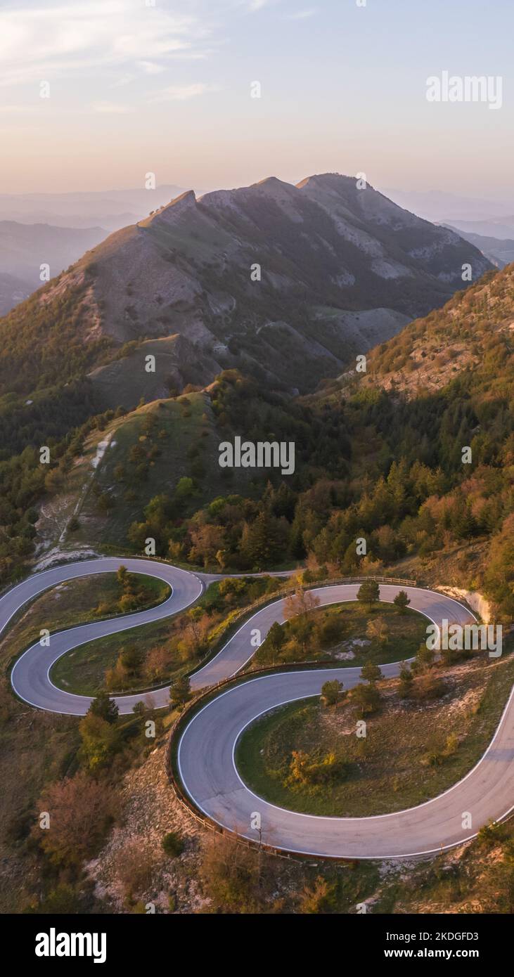 Aerial view of curvy road on monte Nerone slope in Marche region in ...