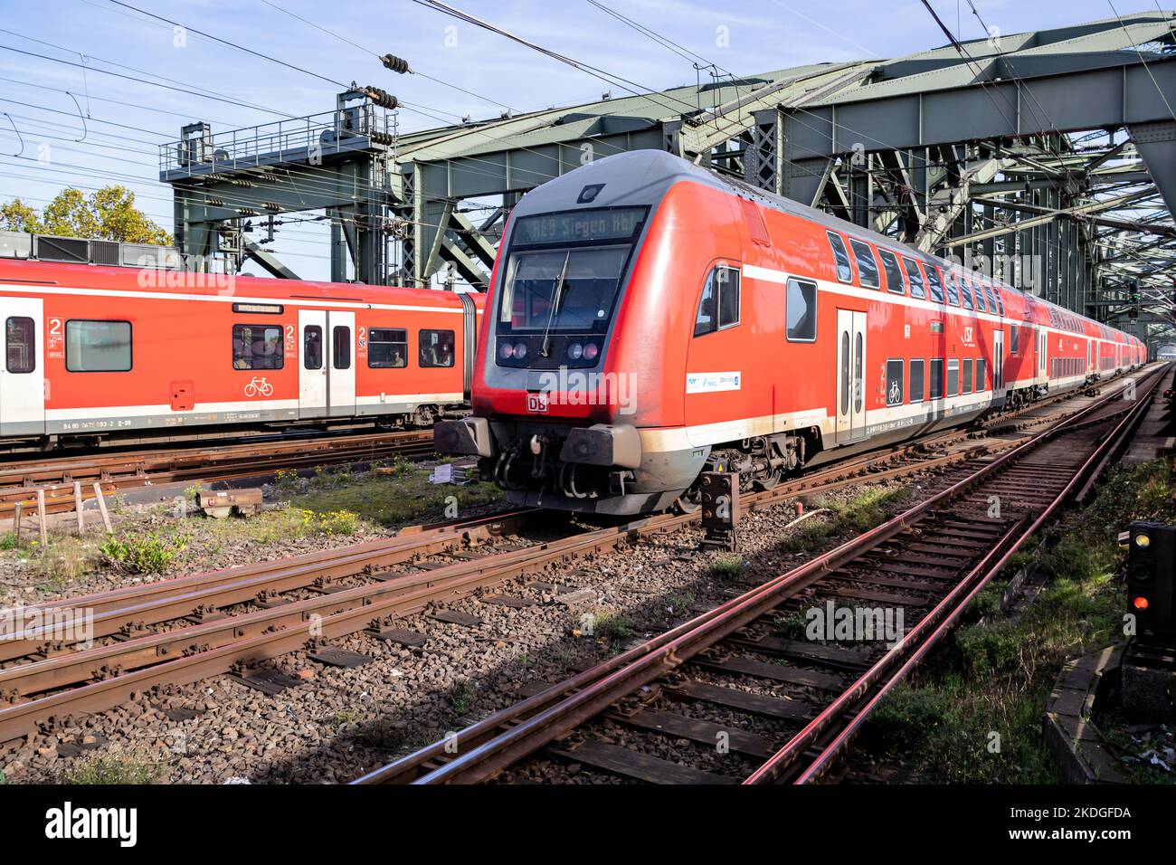 DB Regio train on the Hohenzollern Bridge in Cologne, Germany Stock ...