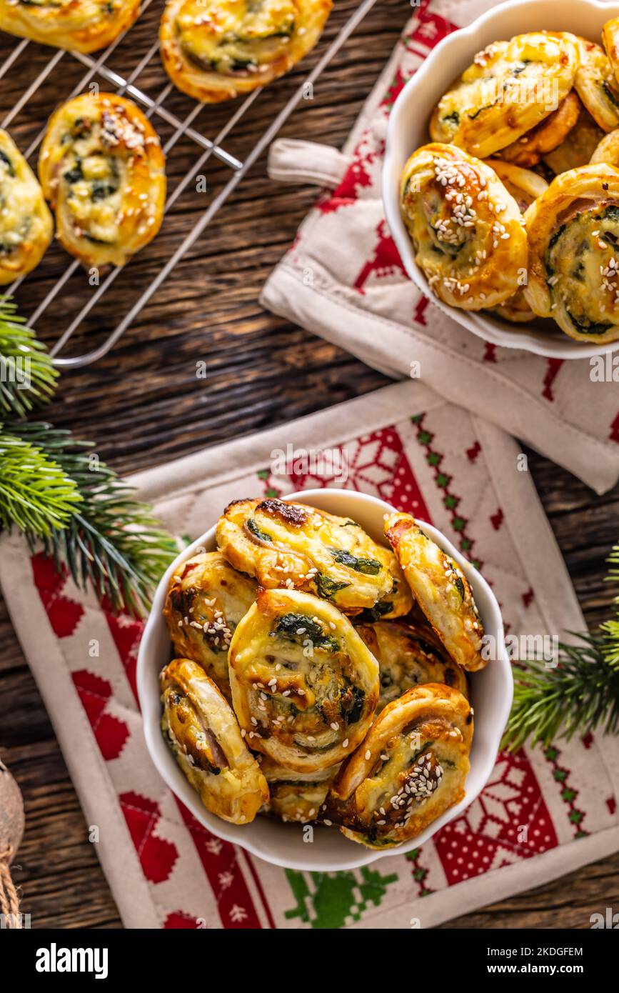 Christmas savory pastries, mini pizza cakes in a typical Christmas dish ...