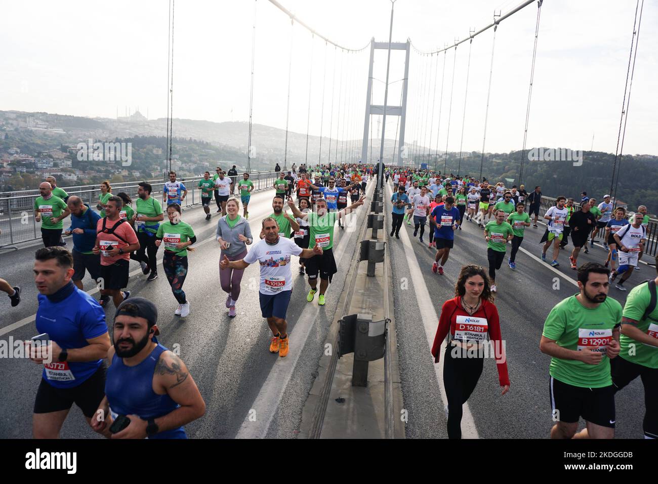 Athletes running on Bosphorus Bridge during the marathon. Istanbul ...