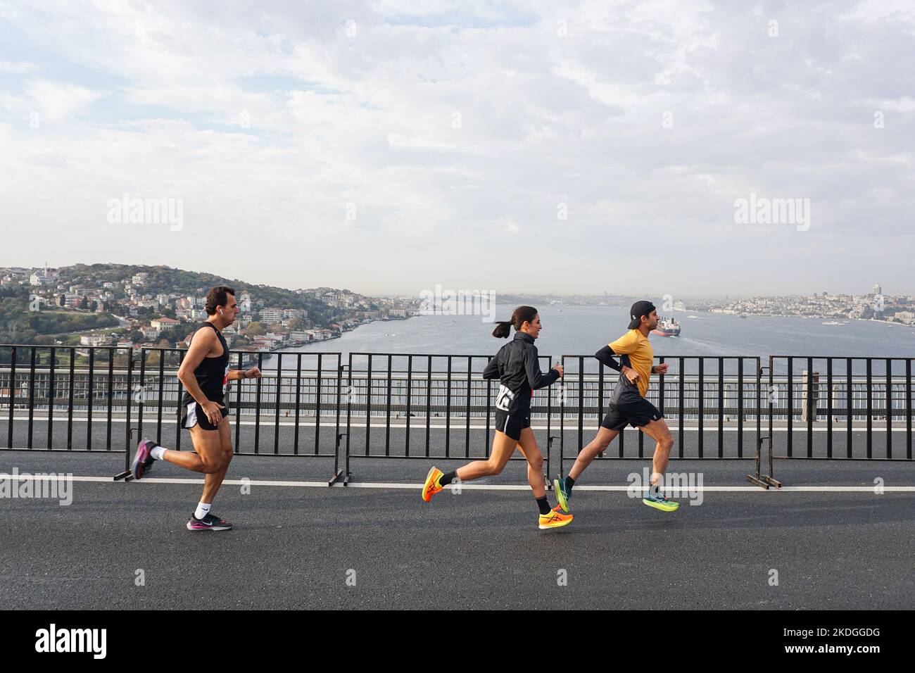 Athletes running on Bosphorus Bridge during the marathon. Istanbul ...