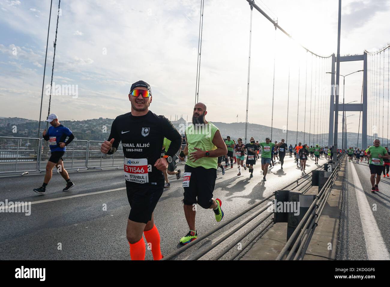 Athletes running on Bosphorus Bridge during the marathon. Istanbul ...