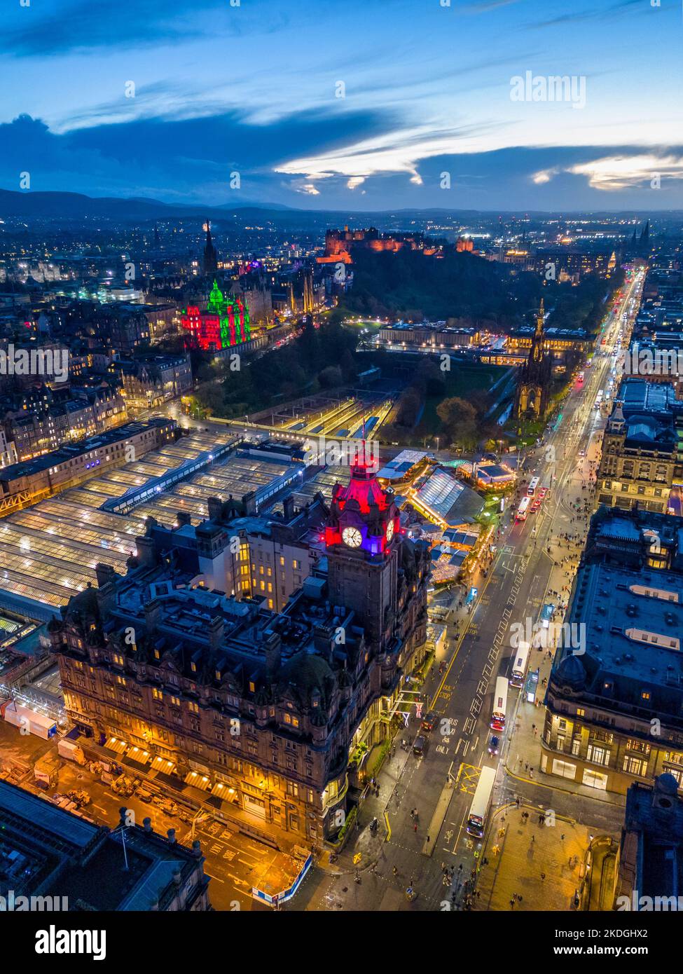 Aerial view of Balmoral Hotel and skyline of Edinburgh at dusk ...