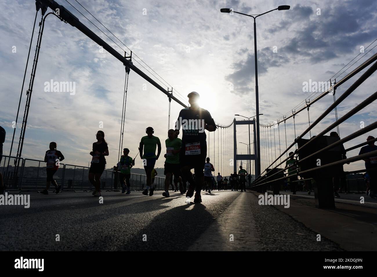 Athletes running on Bosphorus Bridge during the marathon. Istanbul ...