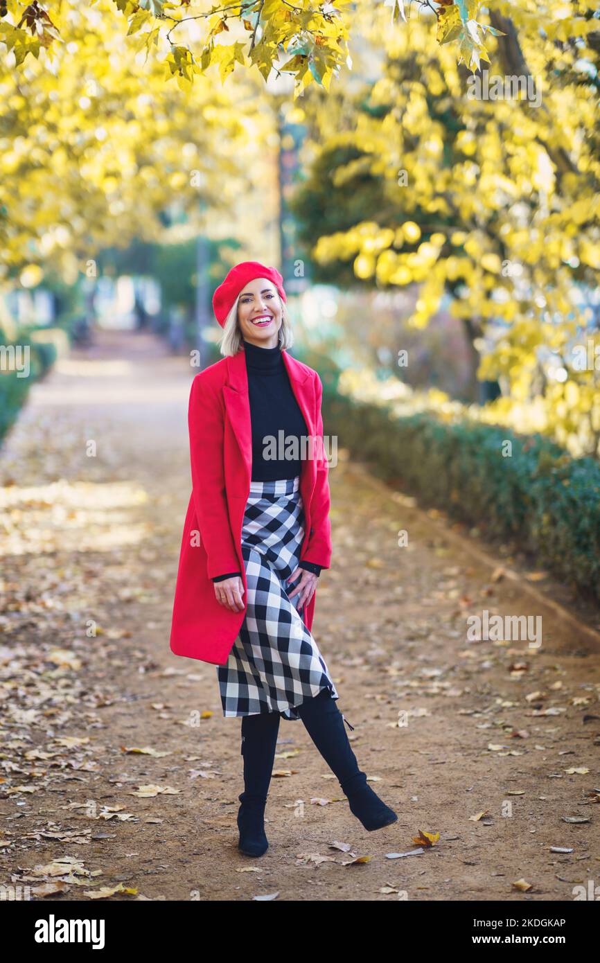 Woman standing in autumn hi-res stock photography and images - Alamy