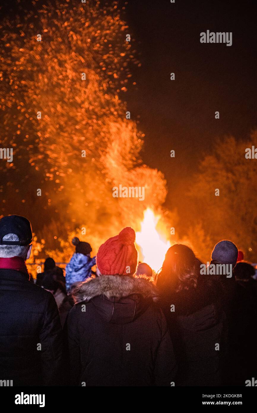 Crowd stood in front of a roaring bonfire at the annual Bicester Round ...