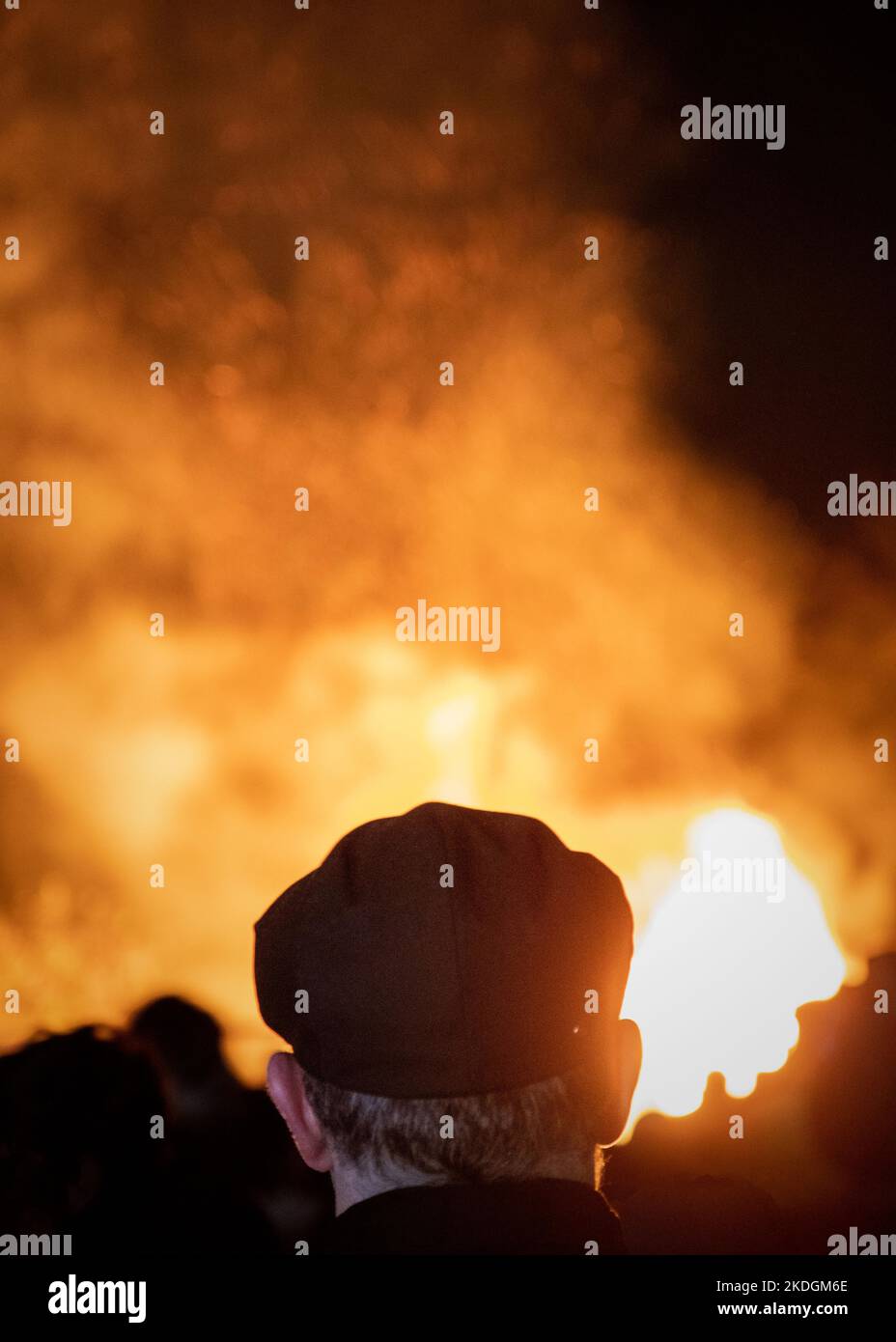 Crowd stood in front of a roaring bonfire at the annual Bicester Round ...