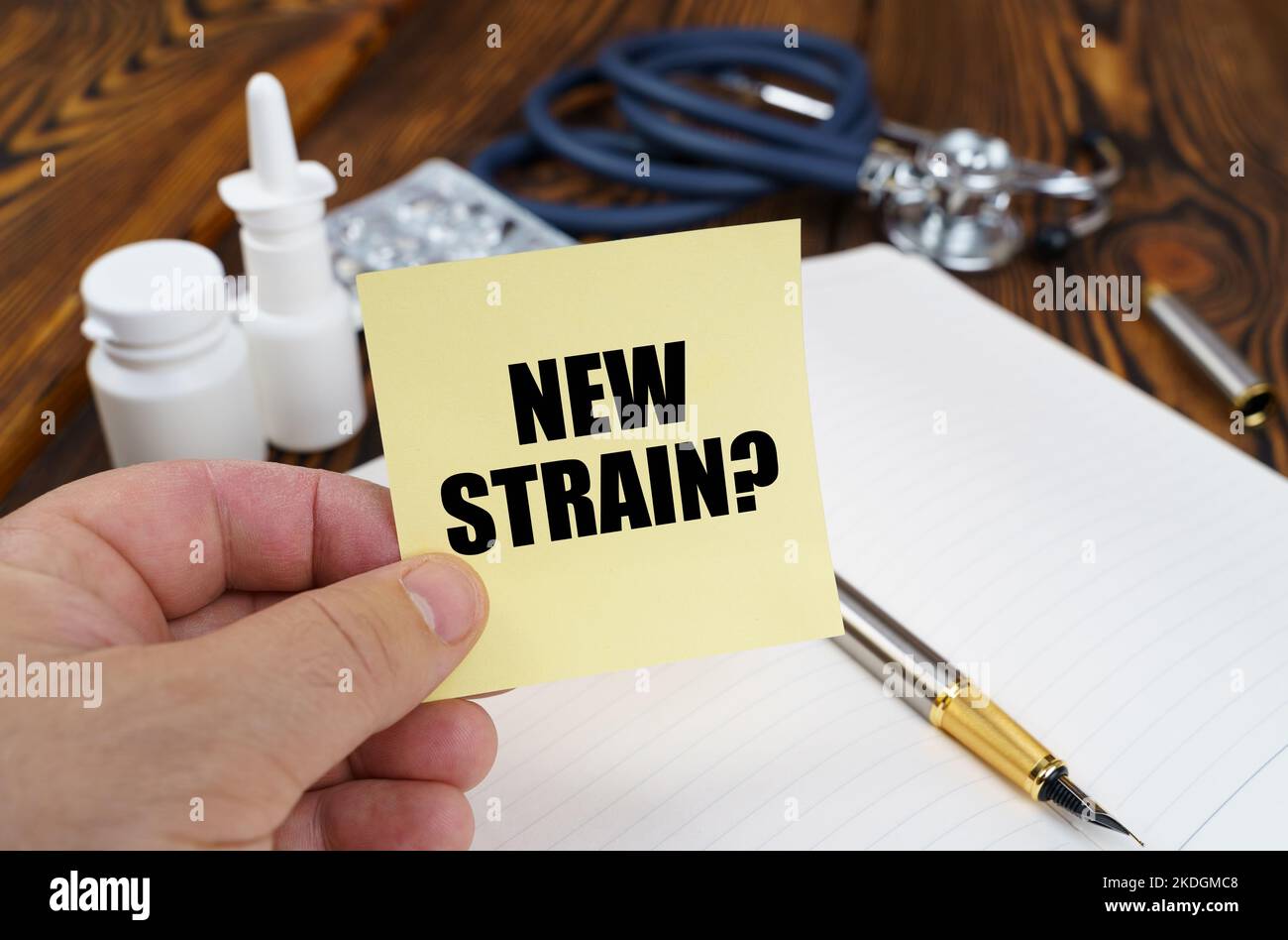 Medical concept. On the table is a notebook, medicines and a ...