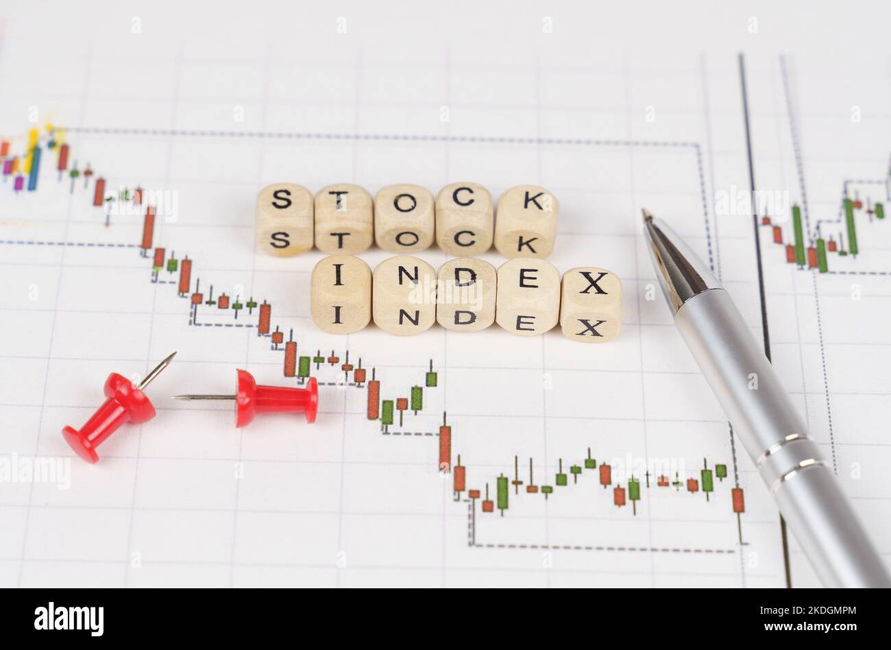 Business concept. On the charts with quotes there are buttons, a pen ...