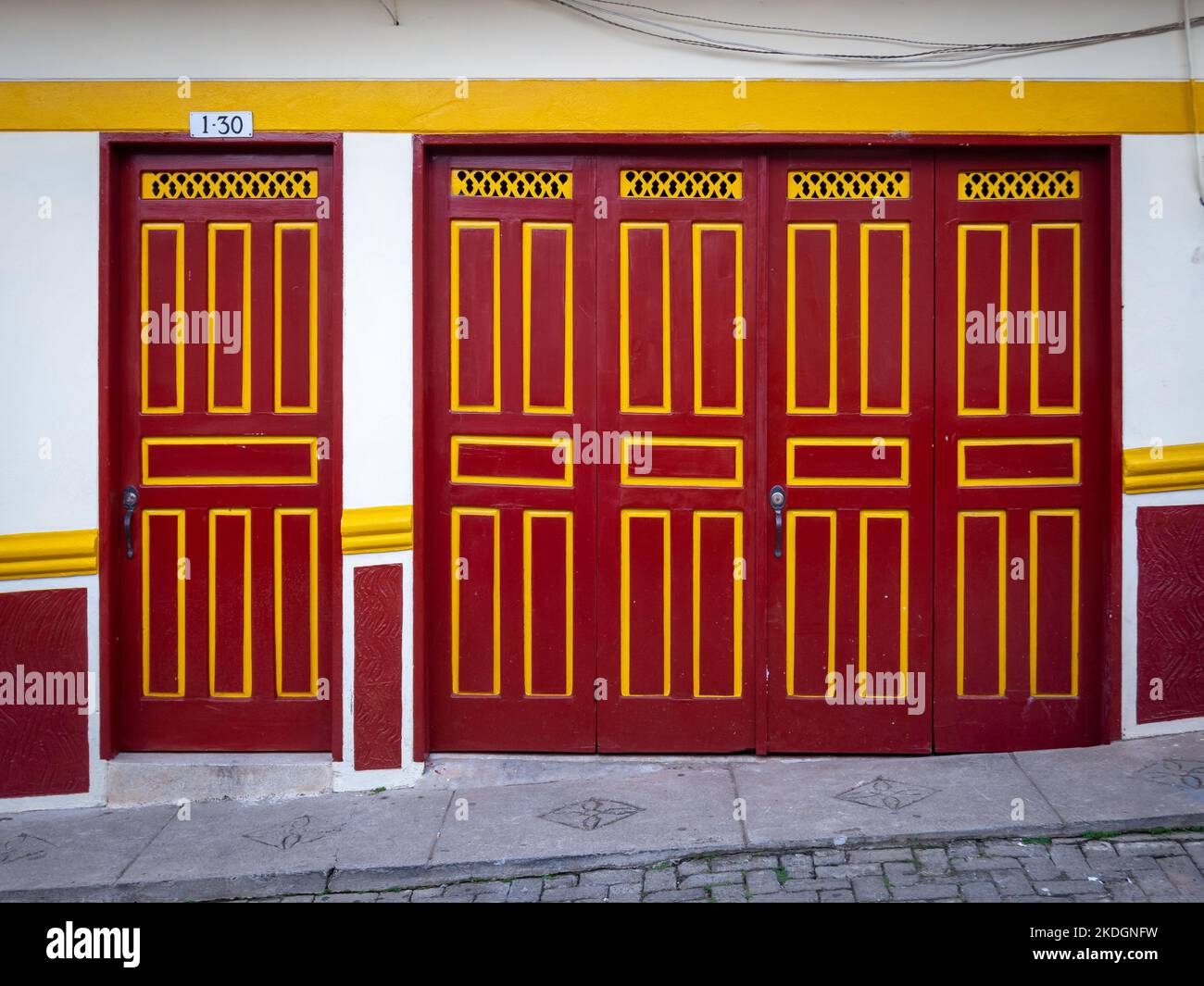 Red and Yellow Doors in a White Background, Characteristic of the Town ...