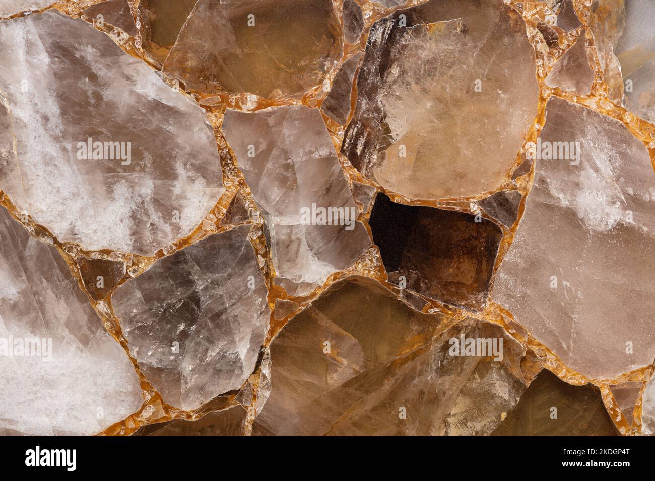 Brown smoky quartz stone slab. Gemstone background. Matt natural semi ...