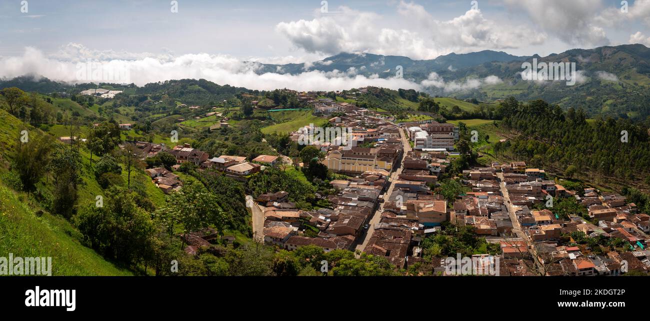 Jerico Cityscape Colonial Houses and Green Meadows and A Christ Statue ...