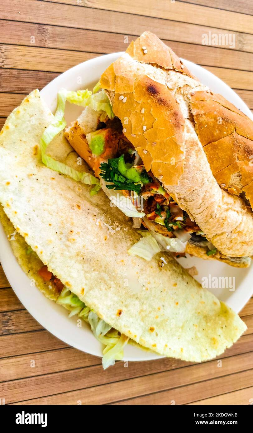 Typical Mexican dishes Tortas Tacos Empanadas and Tamales in Cancun ...