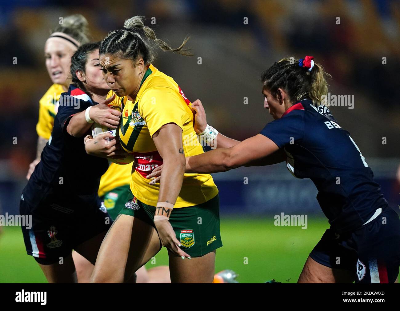 Australia's Shannon Mato (centre) tackled by France's Jeanne Bernard ...