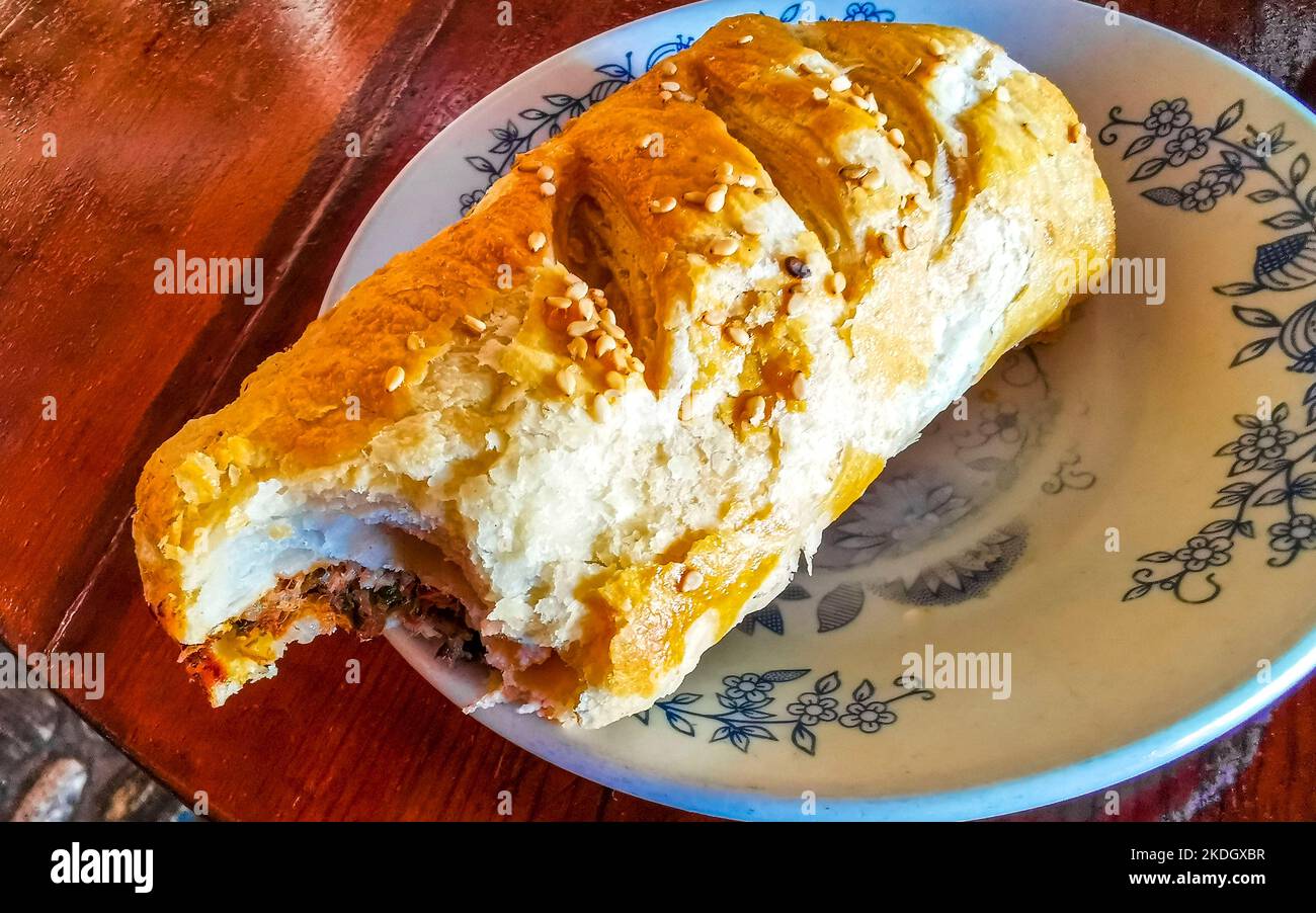 Typical Mexican dishes Tortas Tacos Empanadas and Tamales in El ...