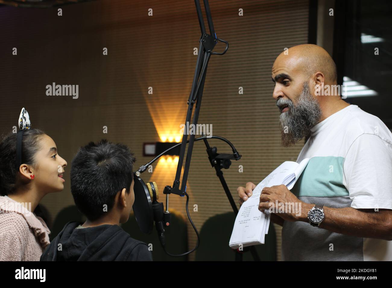 Libyan theater actor Anwar Altair seen training children on an audio ...