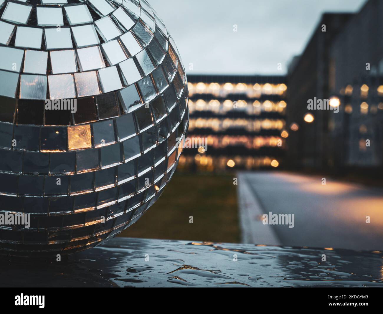 Close-up of disco ball in front of building Stock Photo - Alamy
