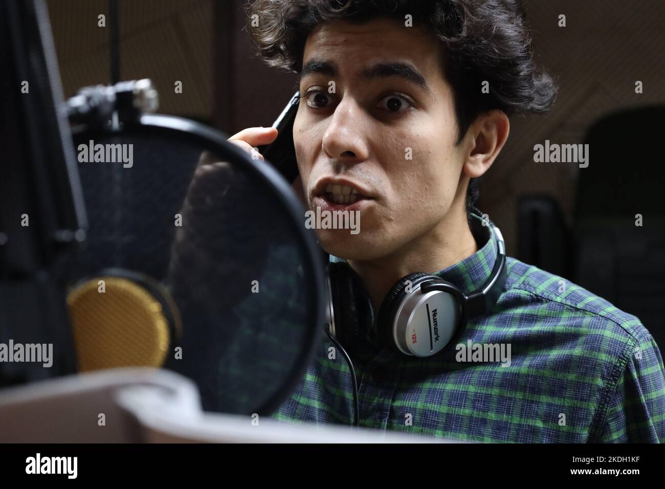 A voice commentator Ayoub Kedah imitates one of the cartoon voices. A ...