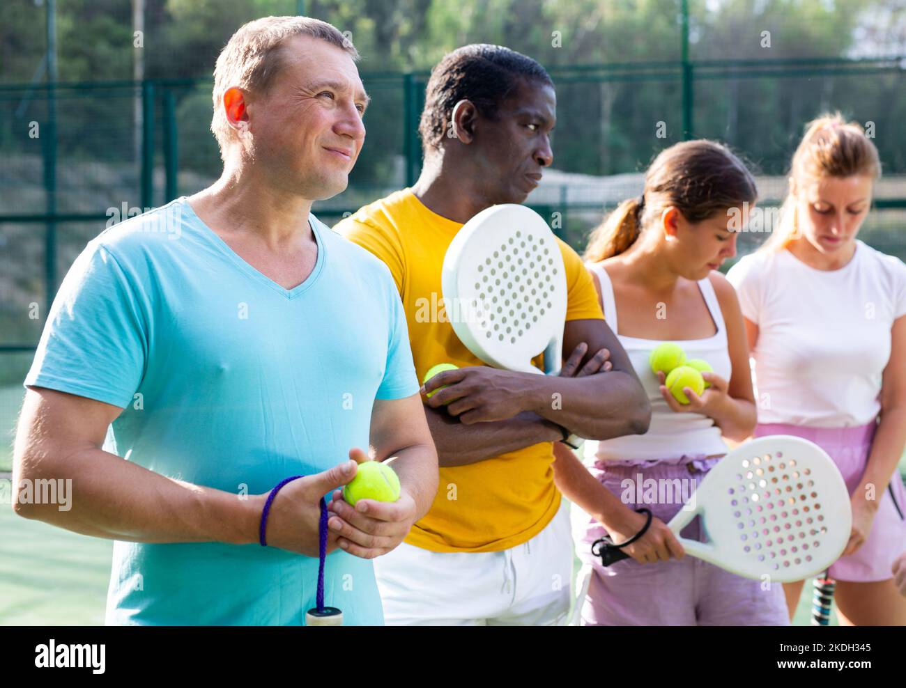 Two man woman discussing padel hi-res stock photography and images - Alamy