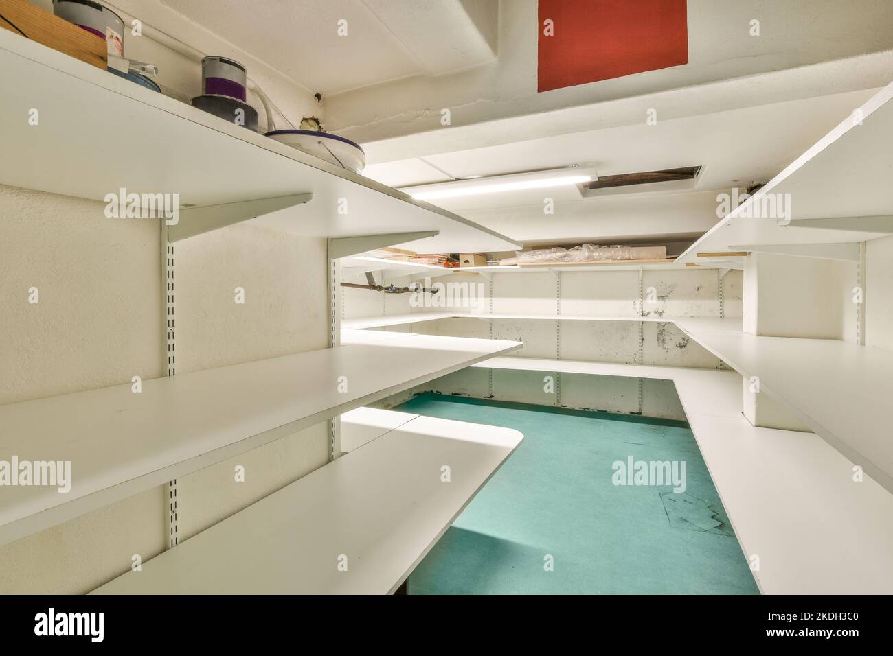 Boiler room of an apartment building with pipes and metering devices. A ...