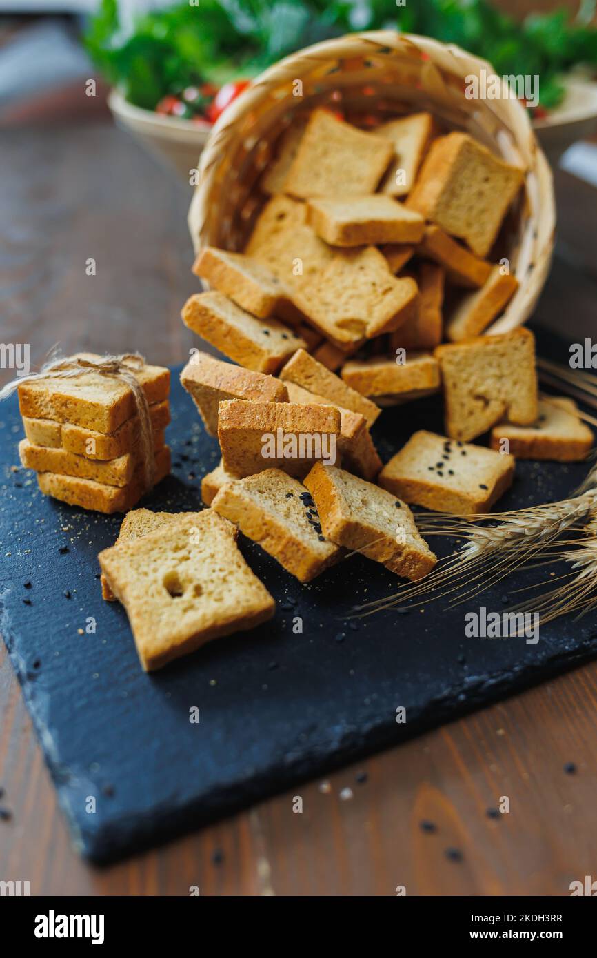 Fresh croutons made of whole grain flour, golden in color. Toasts for ...