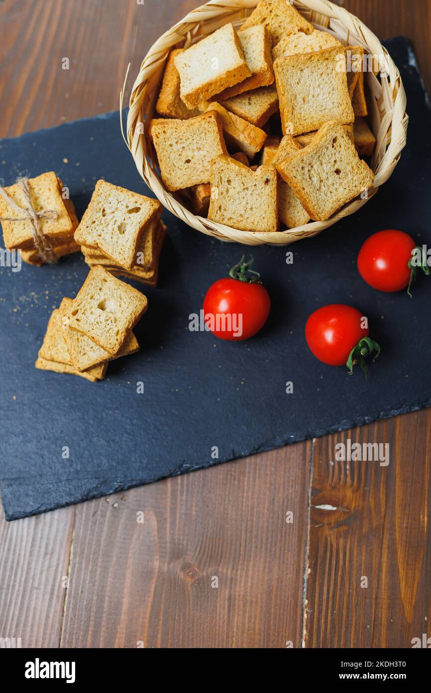 Fresh croutons made of whole grain flour, golden in color. Toasts for ...