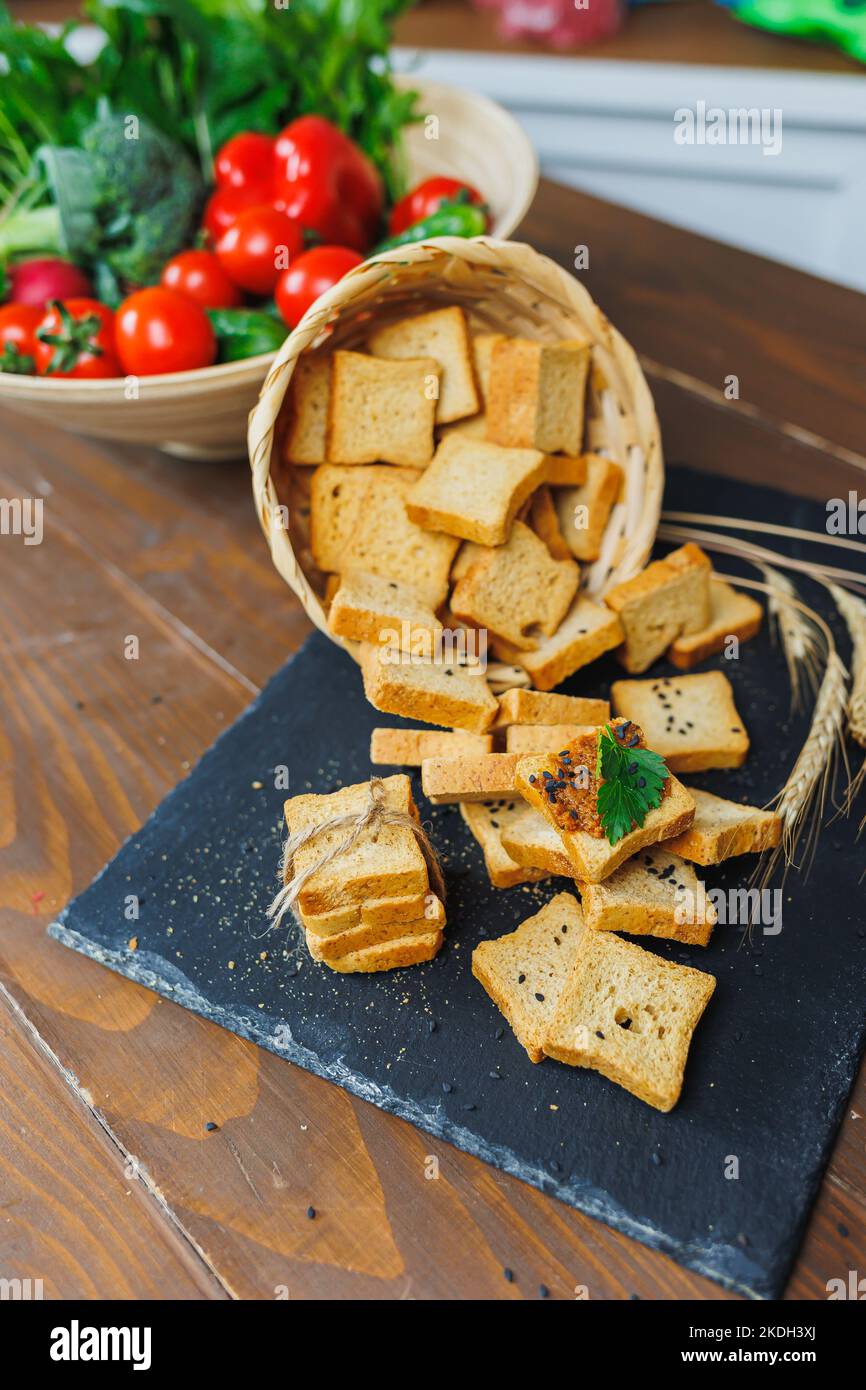 Fresh croutons made of whole grain flour, golden in color. Toasts for ...