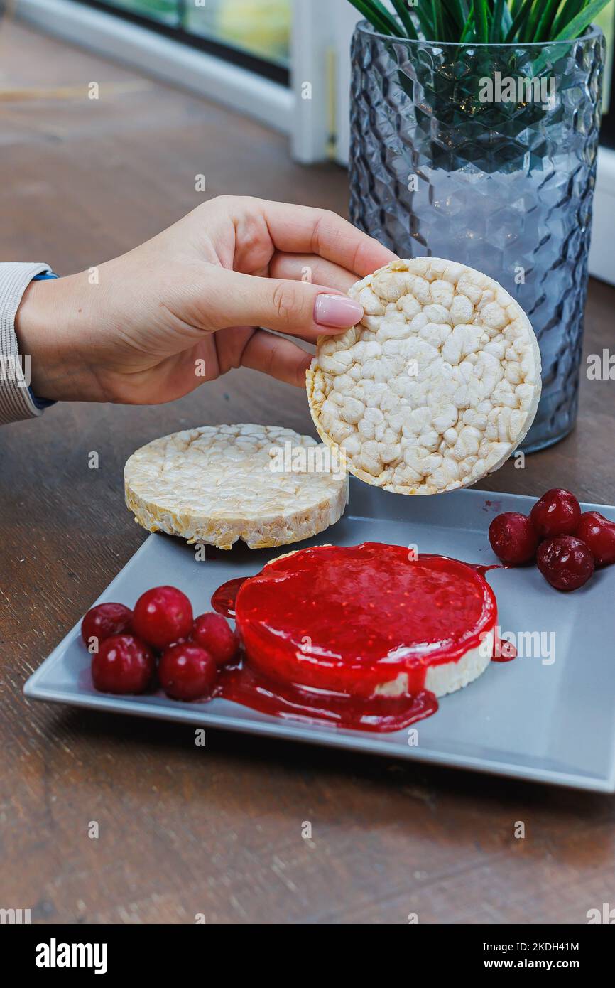 Vegan rice bread for breakfast with jam. Healthy Eating Stock Photo - Alamy