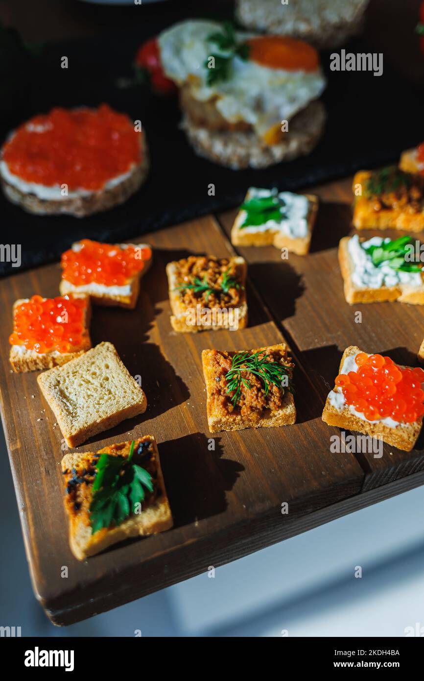 Meat spread on toasted bread with greens. Fresh, delicious croutons ...